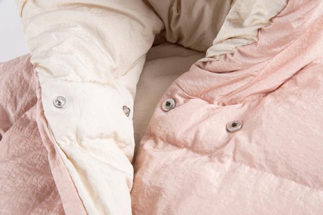 Front view of toddler puffer jacket showing hood and pockets