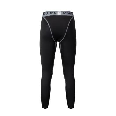 China Men's Compression Leggings with Polyester Spandex Blend for Quick Dry and Breathable Sports Base Layer Pants for sale