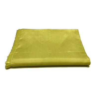 China Tejido para-aramida impermeable de Kevlar flexible amarillo para prendas de vestir en venta