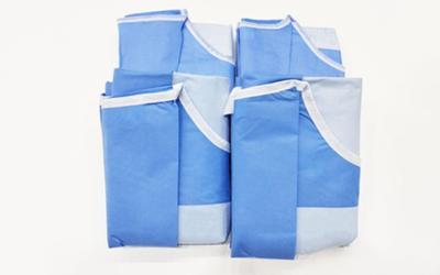 China Medical Breathable Soft Disposable SMS Sterilized Surgical Reinforced Gowns for sale