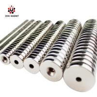 China NdFeB Grade Super Strong Custom Disc Magnet with Hole and Round Countersunk Sharp Design for sale