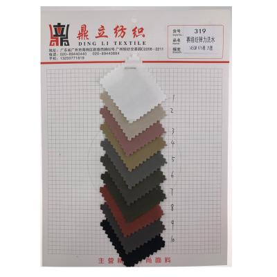 Cina tessuto solido d'annata dell'elastam del cotone 3 del tessuto di cotone della saia della pietra 260gsm 97 per il cappotto in vendita