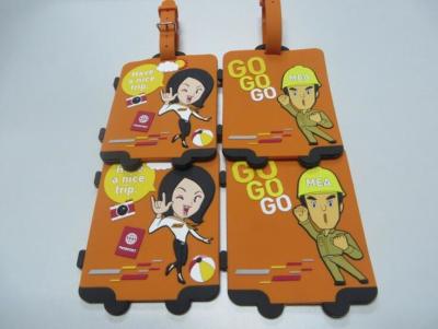 China La etiqueta preciosa del equipaje del aeroplano del PVC de la goma de silicona de la forma de la maleta 3D grabó en relieve el logotipo de la mujer del hombre con la parte posterior de tarjeta de presentación en venta