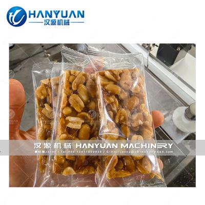 Cina Macchina di imballaggio ad alta velocità 250-300pcs/min Muesli Bar Flow Wrapping con area di 7,2×3m e garanzia di 1 anno in vendita