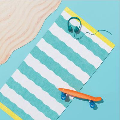 China Wavy Stripe Beach Towel with Velour and Reactive Printing for Stylish Poolside Use for sale