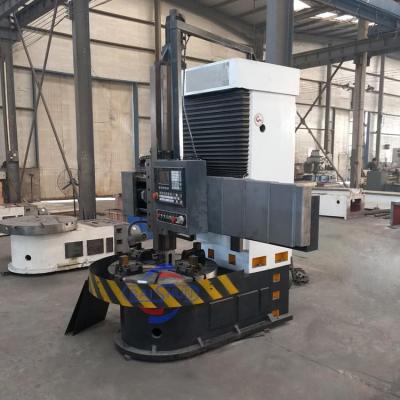 Cina Verticale girante Torno Automaticamente CNC banco torno disco ruota macchina di taglio in vendita
