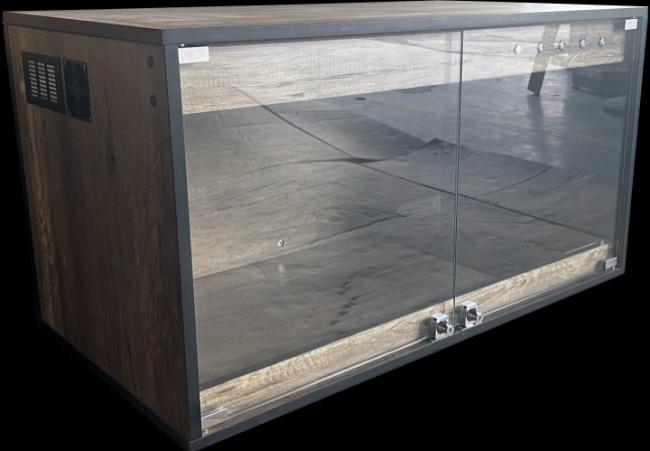 Compact reptile enclosure front view showing ventilation and window