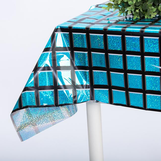 Blue Disco Table Cloth displayed on a rectangular table