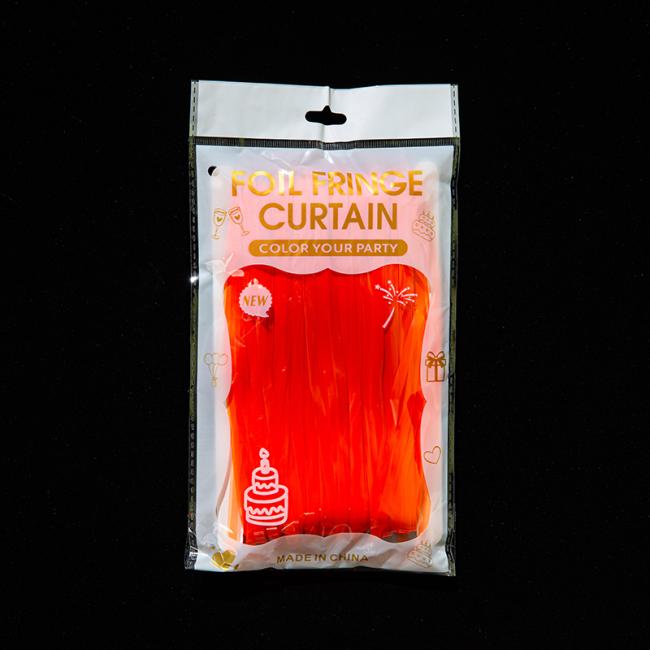 Fluorescent fringe curtain display in outdoor setting