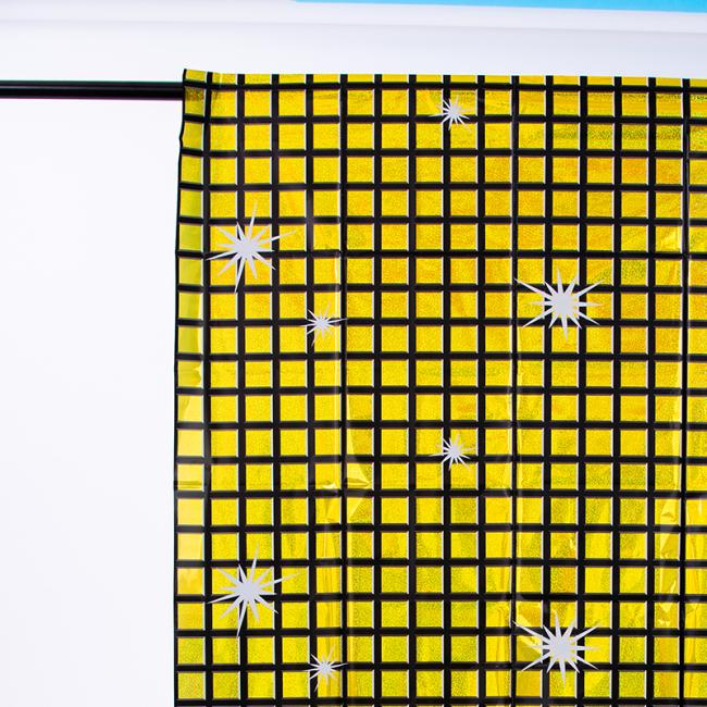 Gold disco tablecloth displayed on a party table