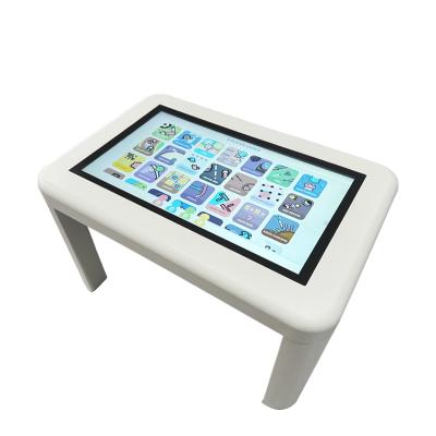 China 32 43 Inch Android 11 Waterproof Interactive Touch Table with Wooden Structure and Coffee Table Design for sale