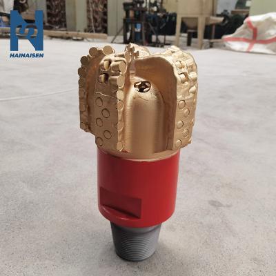中国 オイルの鋼鉄ボディPDCは7つのノズル5の刃のDthのハンマー ボタンをかんだ 販売のため