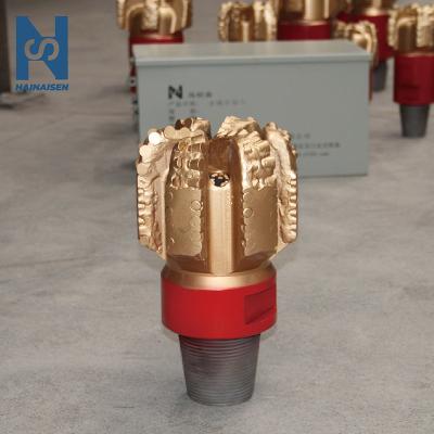 Cina Il corpo PDC del acciaio al carbonio ha morso 4 la lama 76mm che Dth martella le alte velocità di avanzamento in vendita