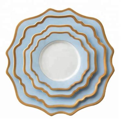 China Hot products colored gold rim irregular wedding porcelain plate set for sale
