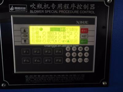 China 500 ml kleine plastic flessen maken machine met 4 holte en semi-automatische werking Te koop