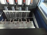 China Semi Automatic 4 Cavity 500ML Small Plastic Bottle Making Machine with Speed Blue Design for sale