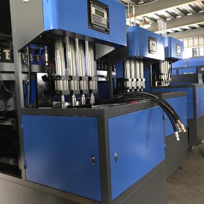 China SMC Rotary Cylinder 4 Cavity Plastic Bottle Blowing Machine for PET Bottle Production for sale