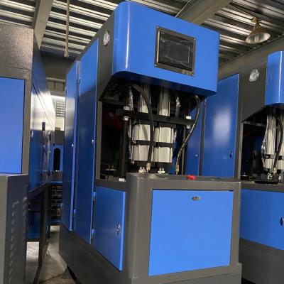 China Semi-automatic Two Cavities Hand Feed Wide Mouth PET Bottle Blowing Machine 2024 Product for sale