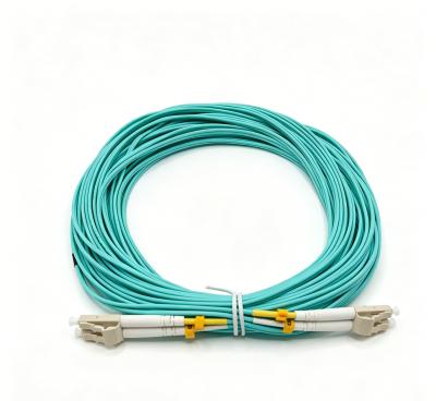 China Aqua Color 2.0mm PVC Duplex OM4 Multimode Fiber Patch Cord with Dual LC UPC Connectors, 15 Meters Length for sale