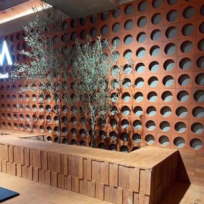 China Building Wall Panels Artificial Terracotta Breeze Block Concrete Natural Red Perforated Brick for sale