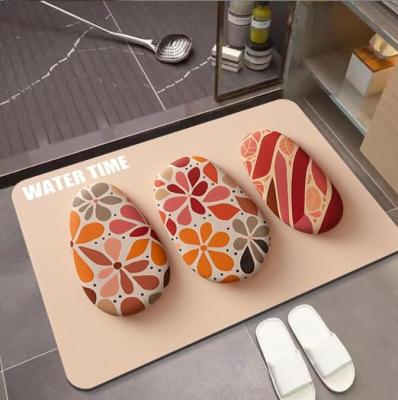 Cina Matera per pavimenti da bagno in pietra ad espansione Cartoon Pebble Diatom Matera per pavimenti in fango Assorbente di olio da cucina in vendita