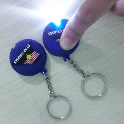 Китай Один двойной, котор встали на сторону мягкий PVC Keychain, электрофонарь Keychain СИД высокой яркости продается