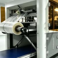 China Automatic Bottle Packing Machine With Intelligent Multi Layer Packaging And Conveyor System for sale