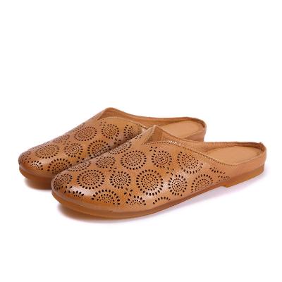 China S148 Factory ethnic style flat bottom hollow Baotou sandals retro handmade slippers fashion all-match simple women's for sale