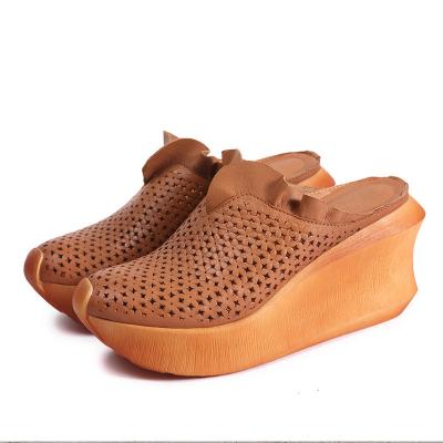 China S464 Leather Casual Ethnic Style Sandals Retro Hollow Sponge Cake Wedges With Slippers Handmade Women'S Shoes Explosive for sale