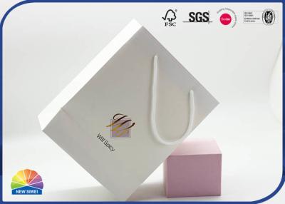 China Eco Friendly Paper Gift Packaging Bag Logo 4C Pritned With White Ribbon for sale