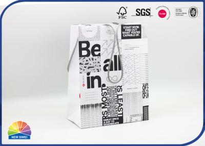 China Custom Print Paper Shopping Bags With Cotton Ropes For Clothes for sale