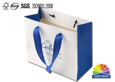 China Colored Cotton Flat Ribbon Handle White Cardboard Printed Paper Bags for sale