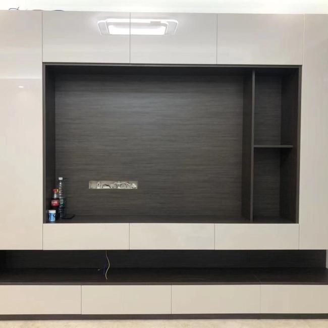 White TV cabinet with soft-close drawers in modern living room