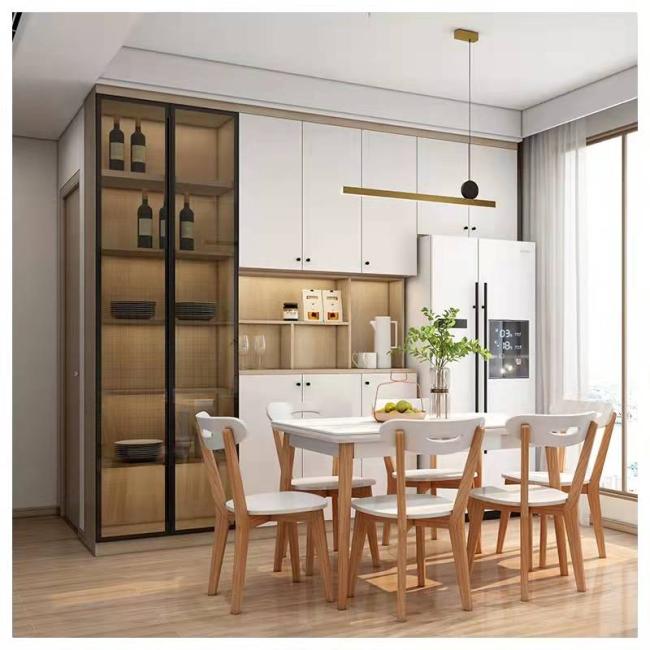 Modern dining room table set with wood top and fabric chairs in contemporary interior