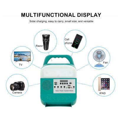 Cina Sistema energetico di Mini Portable Solar Home Lighting Mp3 per la lega di alluminio all'aperto in vendita