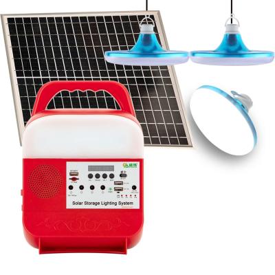 中国 家12v DCの太陽光エネルギーシステム小型携帯用25wは携帯用家エムピー・スリーを持ち上げる 販売のため