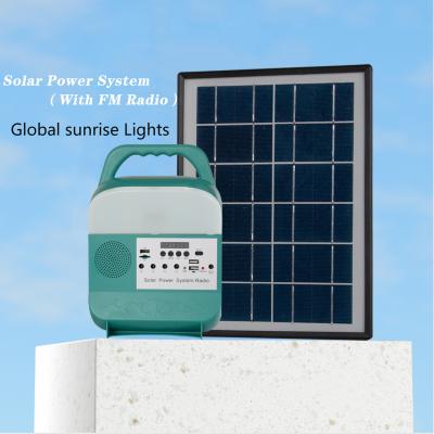 中国 スピーカーFMのラジオが付いている3pcs携帯用5W太陽発電機の家の照明装置3.7V 販売のため