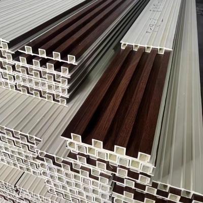 China Fluted Wall Panel Cladding Wood Plastic Composite WPC Wall Ceiling Panel Laminated Wood Veneer for sale