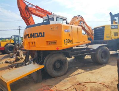 Cina Escavatore gommato Hyundai R130W usato in magazzino Sencondhan Mobile Digger Hyudai R130W R200W Prezzo economico in vendita