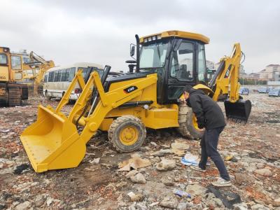 中国 驚かせる価格の優秀な働く状態の使用された幼虫のバックホウの積込み機416e。中古猫のバックホウの積込み機416e、420f、販売のための430fare。 販売のため