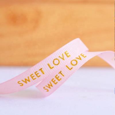Cina Custom Gold Foil Logo Grosgrain Ribbon 25mm Printed Ribbon for Christmas Gift Packing in vendita