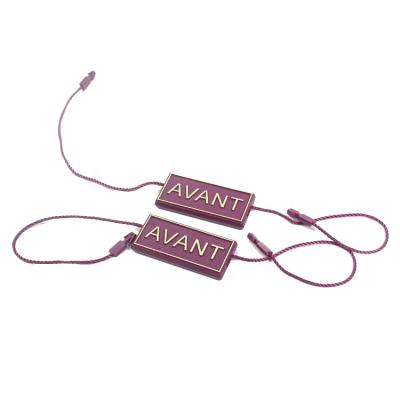 Cina Cheap Custom Brand Name Gold Foil Embossed Logo Plastic Security Seal Tags for Garment Accessory in vendita