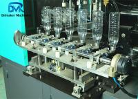 China DMK-4000 Automatic Plastic Water Bottle Making Machine 4-Cavity 3800-4200 Bottles/Hour Capacity for sale
