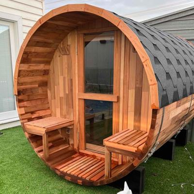 Cina Solid Wood Outdoor Barrel Sauna Hemlock Cedar Wood Wet Steam Traditional Sauna Room in vendita