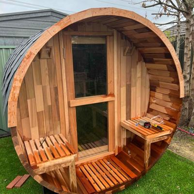 Cina Solid Wood Outdoor Barrel Sauna Hemlock Cedar Wood Wet Steam Traditional Sauna Room in vendita