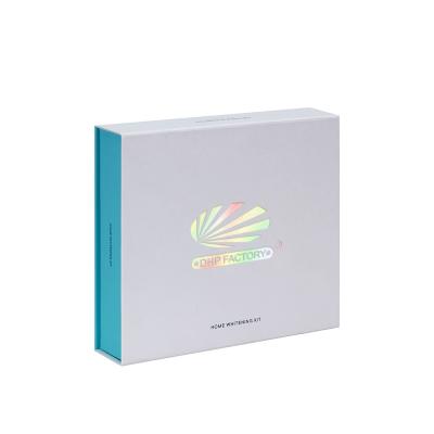 China Caja de contenedor magnético de cartón con bandeja de inserción de papel para una caja de almacenamiento de alineador transparente en venta