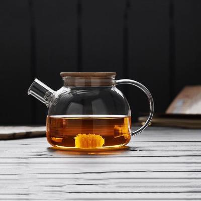 China High borosilicate glass thermal insulated tea pot with bamboo lid for sale