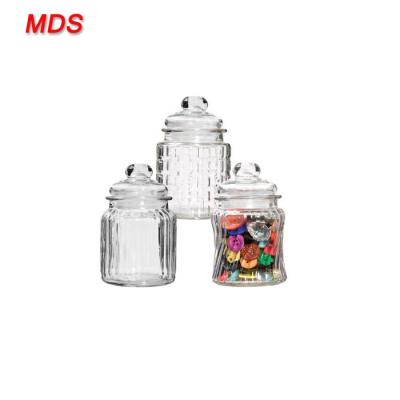 China Home decor vertical stripe glass candy jar with sealing lids for sale