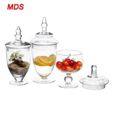 China Clear bulk decorative glass apothecary jars with lids for sale
