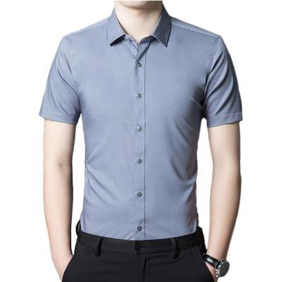 Cina T-shirt da lavoro da uomo con manica corta in formale Top da ufficio a colori solidi Buttone in basso OEM in vendita